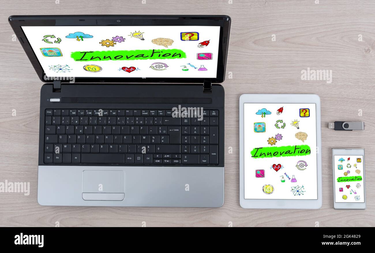 Innovation concept shown on different information technology devices ...