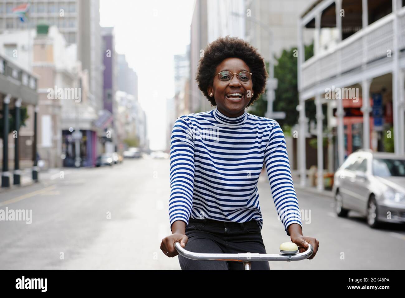 Female cycling city hi-res stock photography and images - Alamy