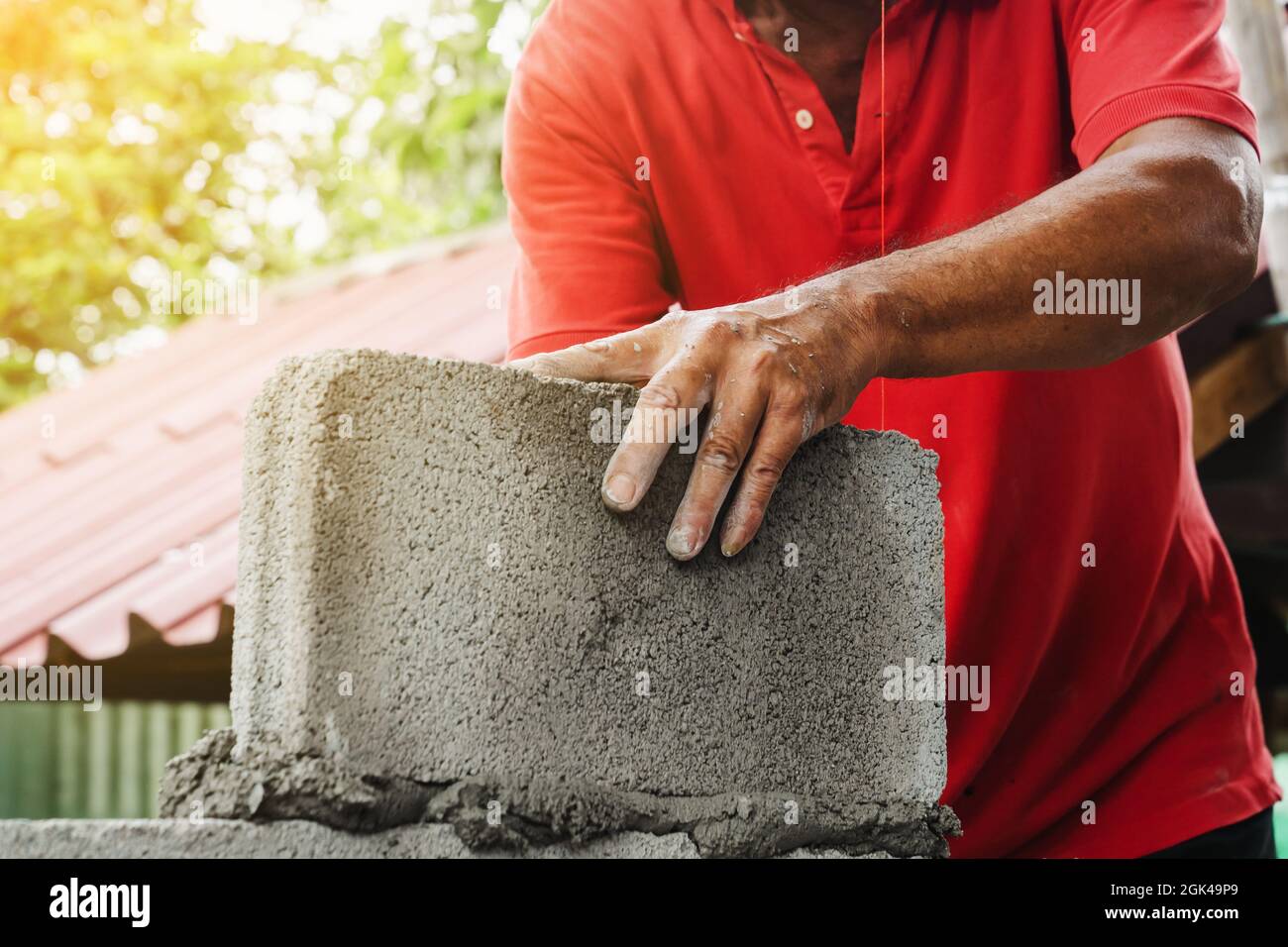bricklayer man working build for construction at home Stock Photo - Alamy