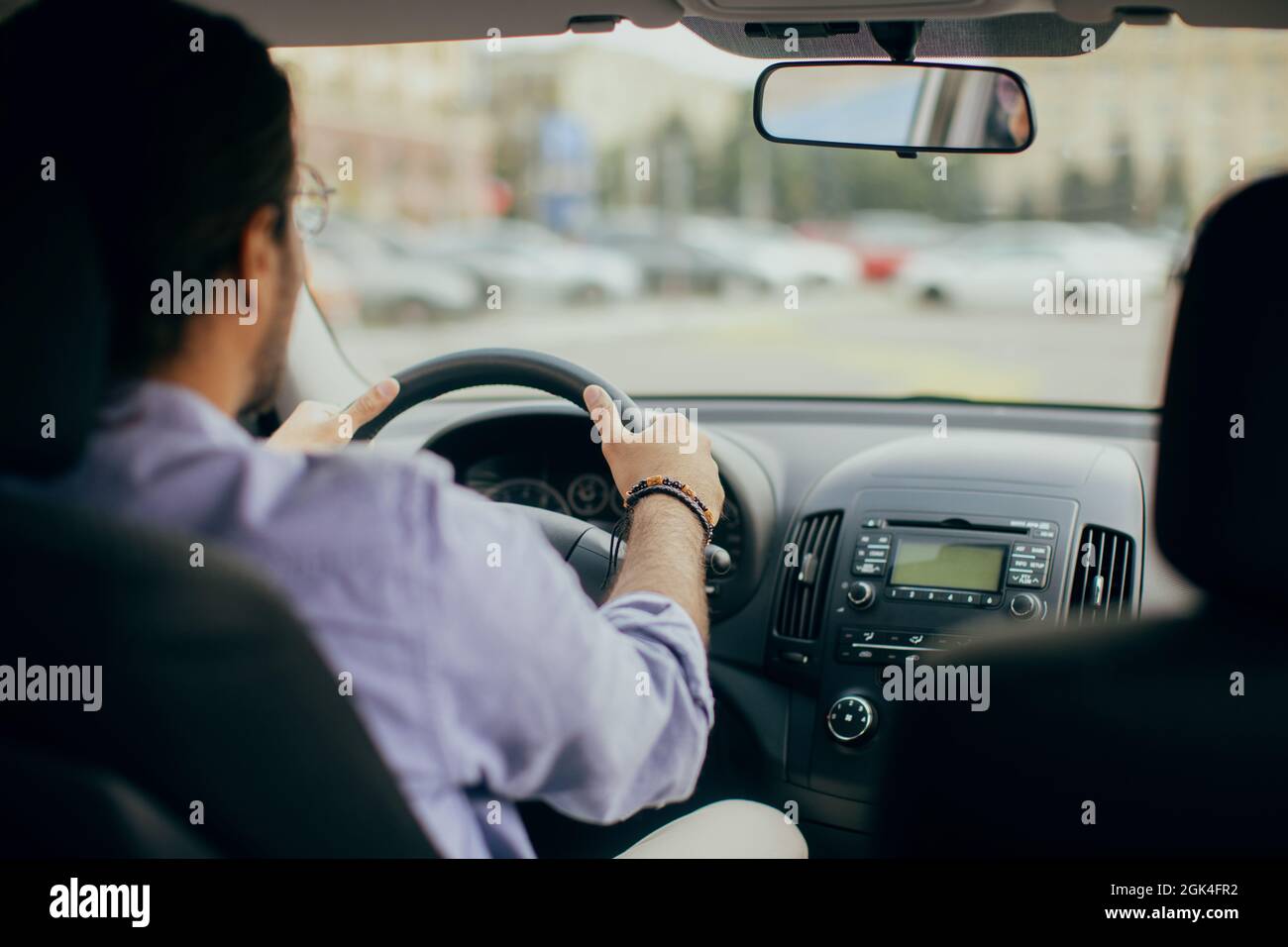 Indian man driving car hi-res stock photography and images - Alamy