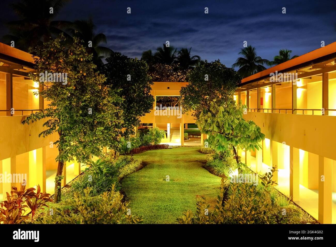 Night lights in a resort courtyard Stock Photo - Alamy