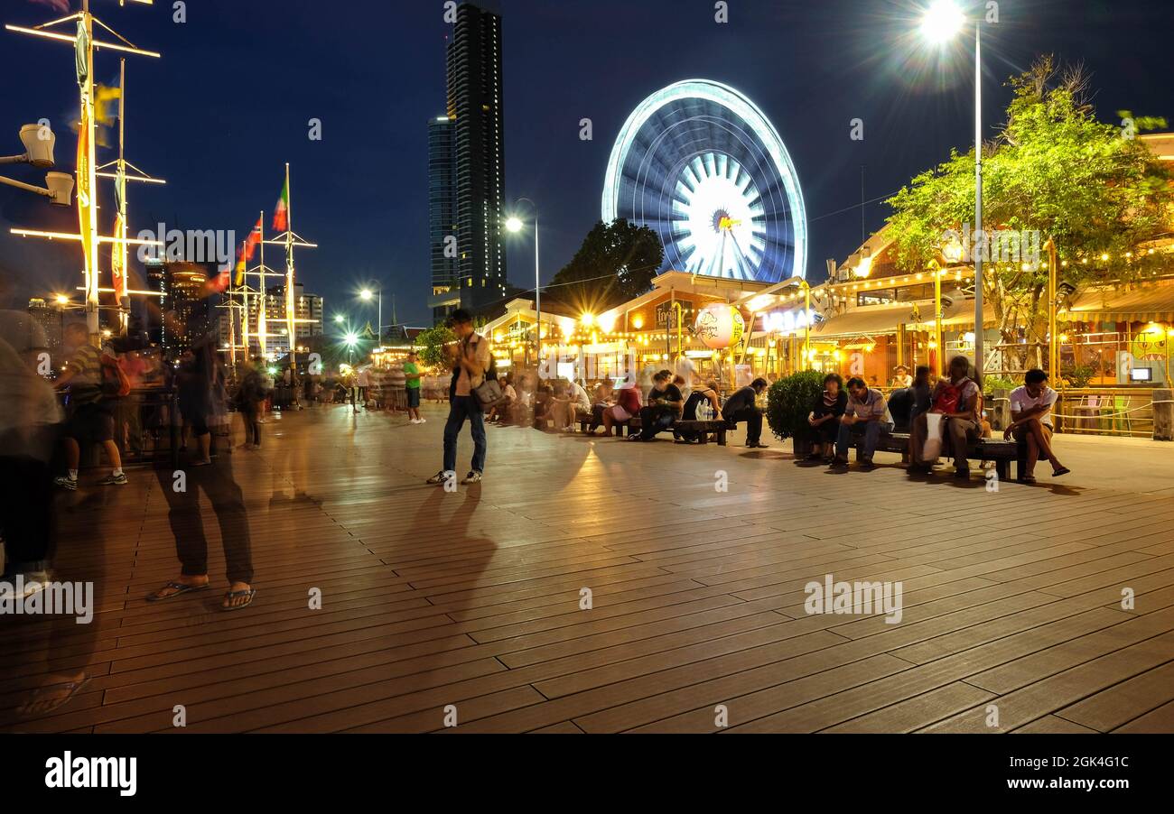 Tourists at a riverside boardwalk in Bangkok Stock Photo - Alamy