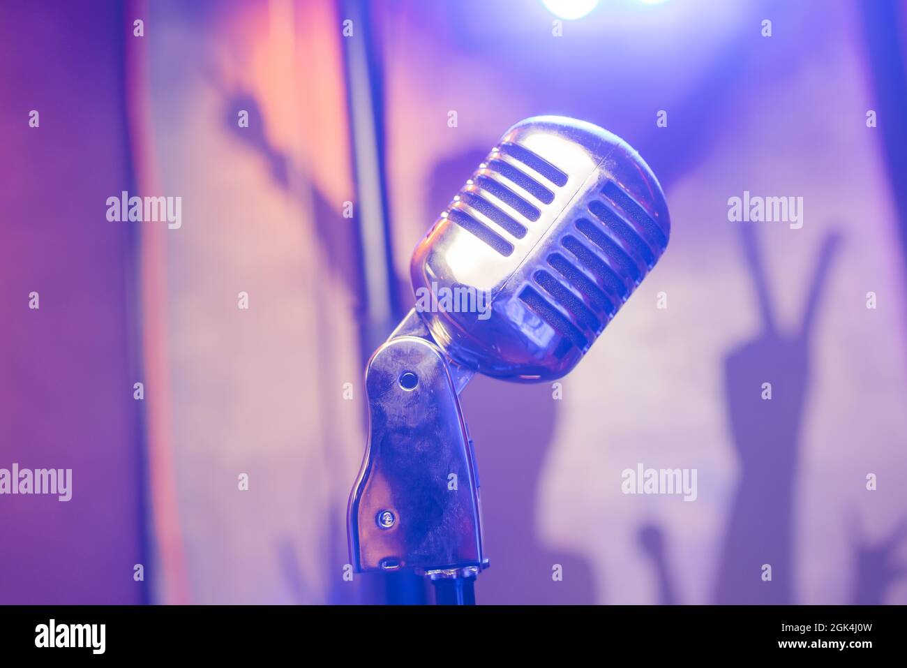 Retro microphone on stage in a pub or American Bar restaurant during a ...