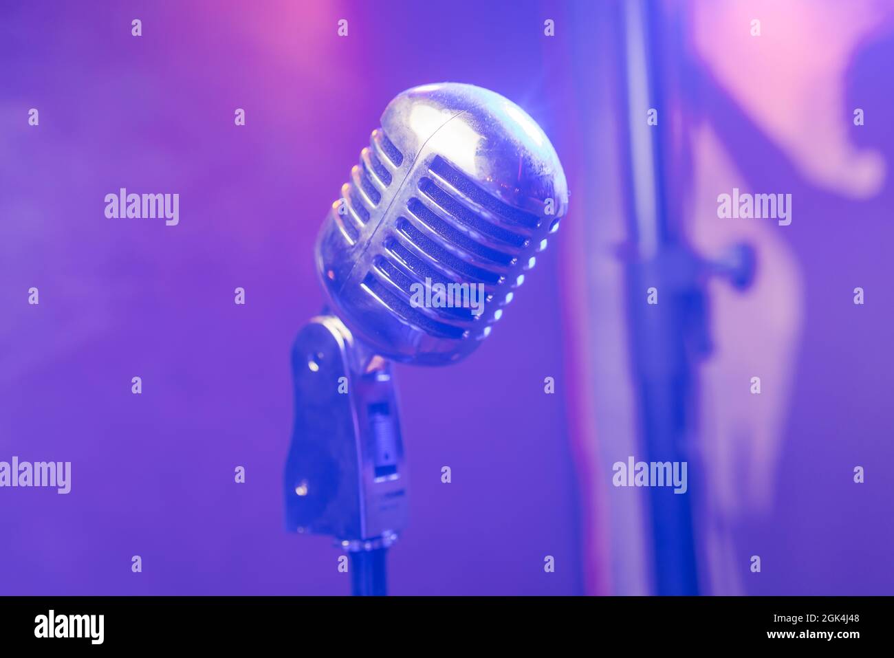 Retro microphone on stage in a pub or American Bar restaurant during a ...