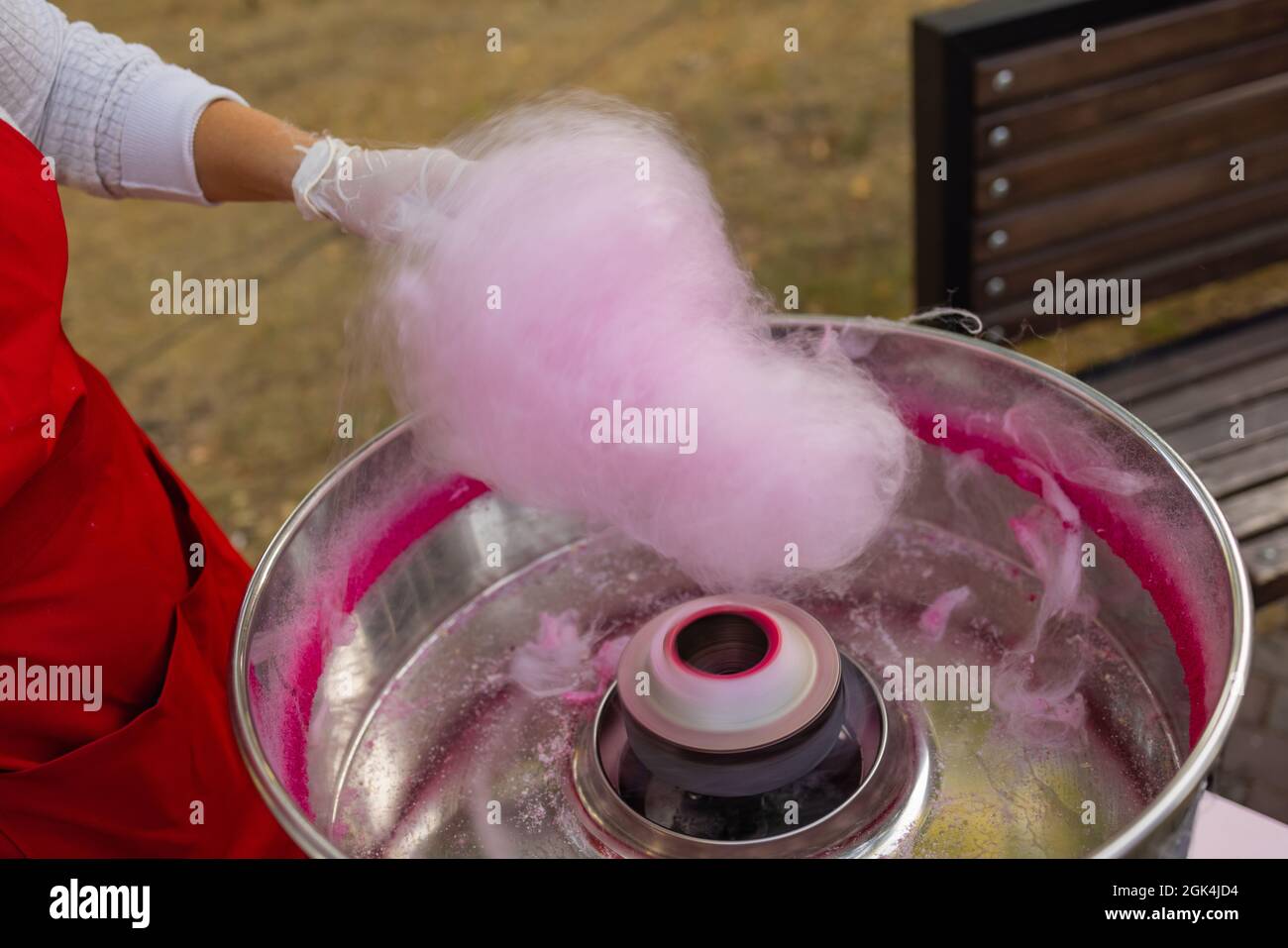 People make cotton candy for children close-up Stock Photo - Alamy