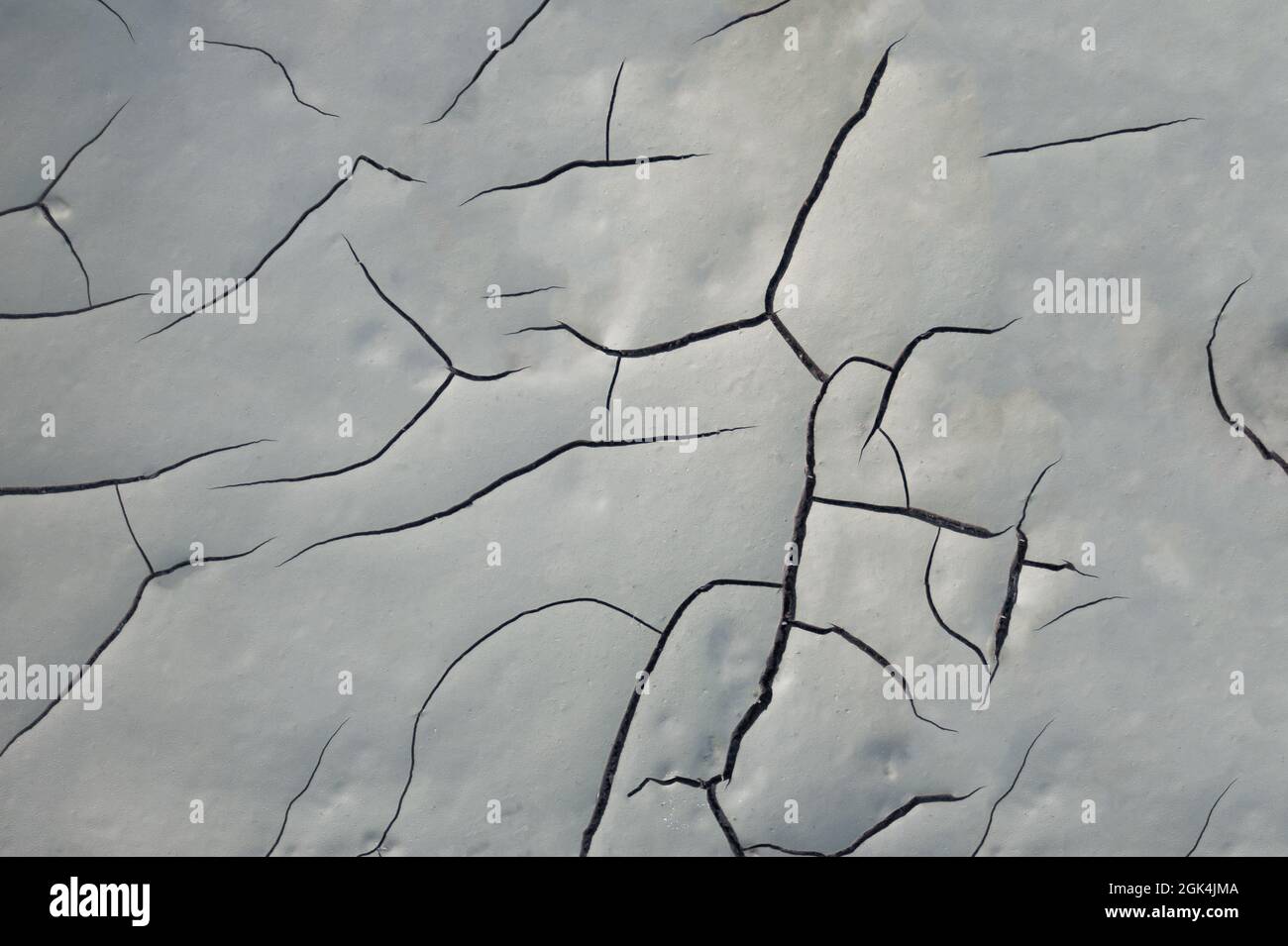 texture dried puddle and cracked dry ground Stock Photo - Alamy