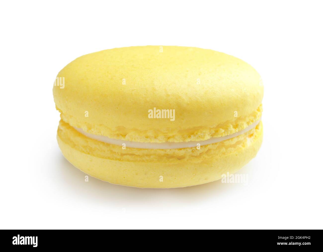 Lemon macaron on white background Stock Photo - Alamy