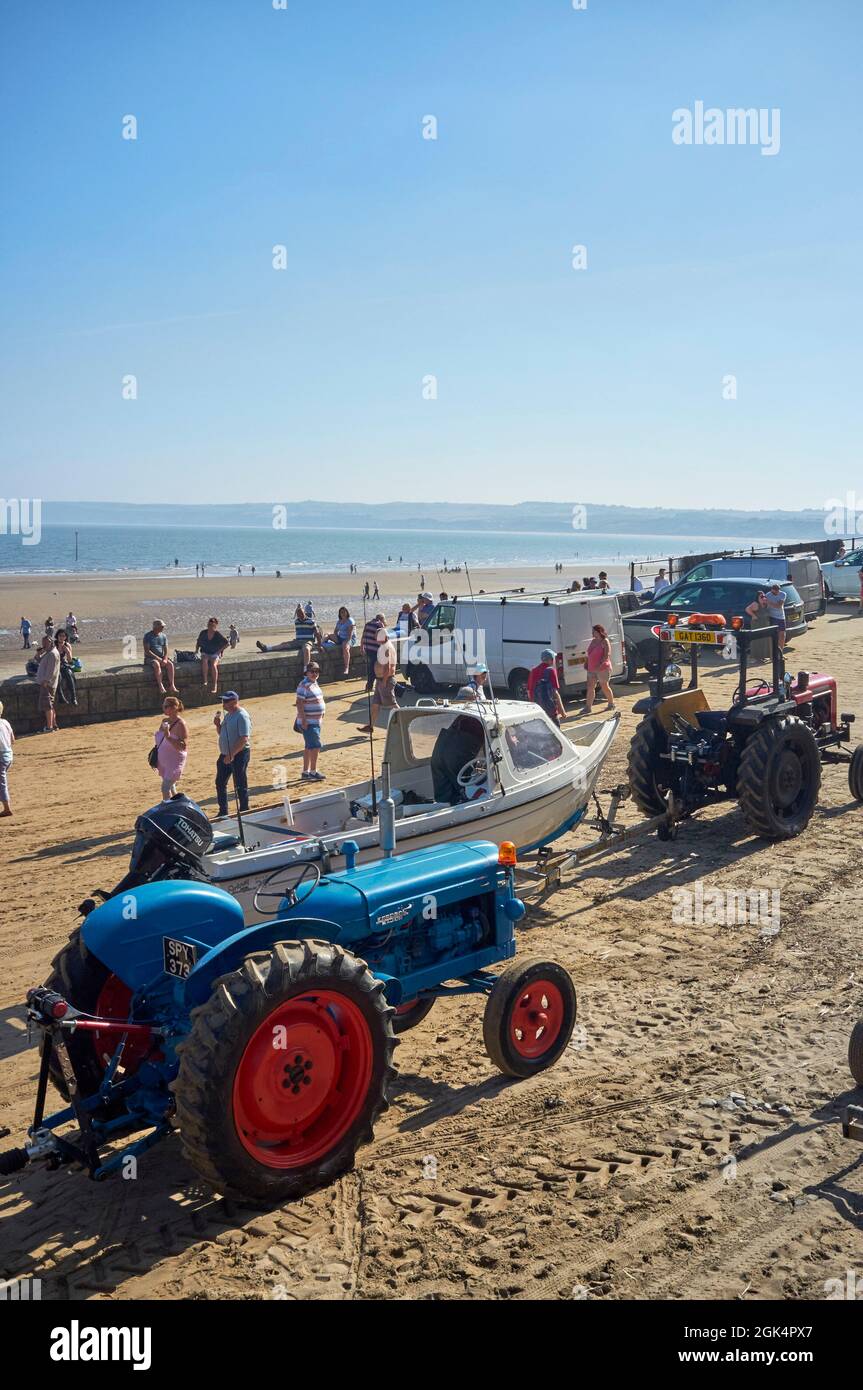 Fishing boats at Filey Beach, North Yorkshire east coast, busy with ...