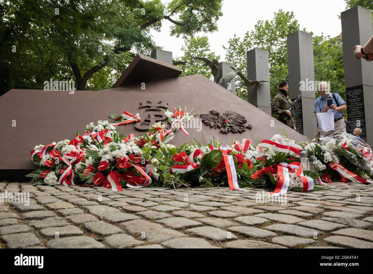 Wreaths lay at the base of a monument commemorating the 1944 Warsaw ...
