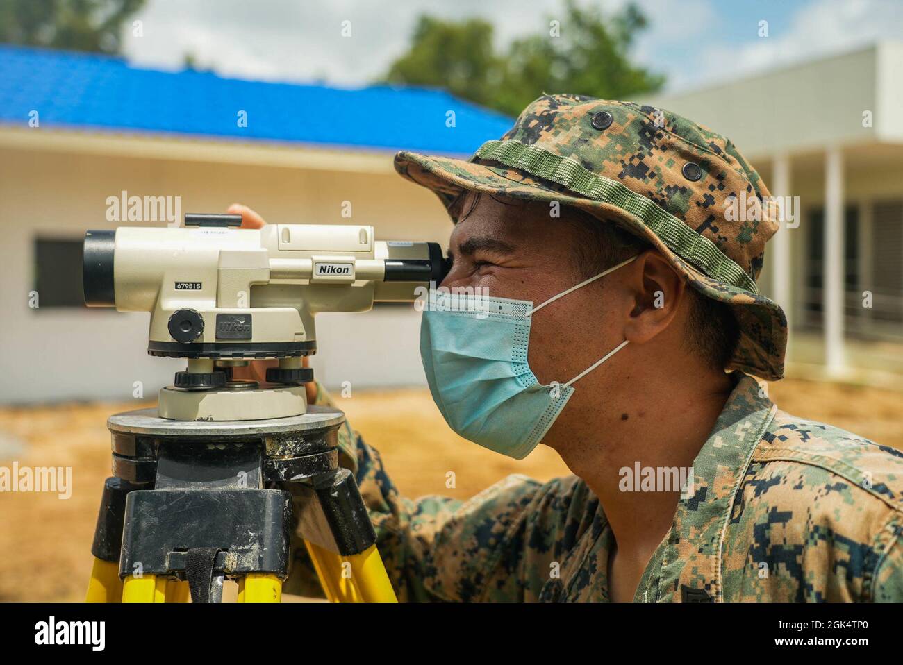 U.S. Marine Corps Cpl. Alam-Michael Kelly, a design and surveyor with ...