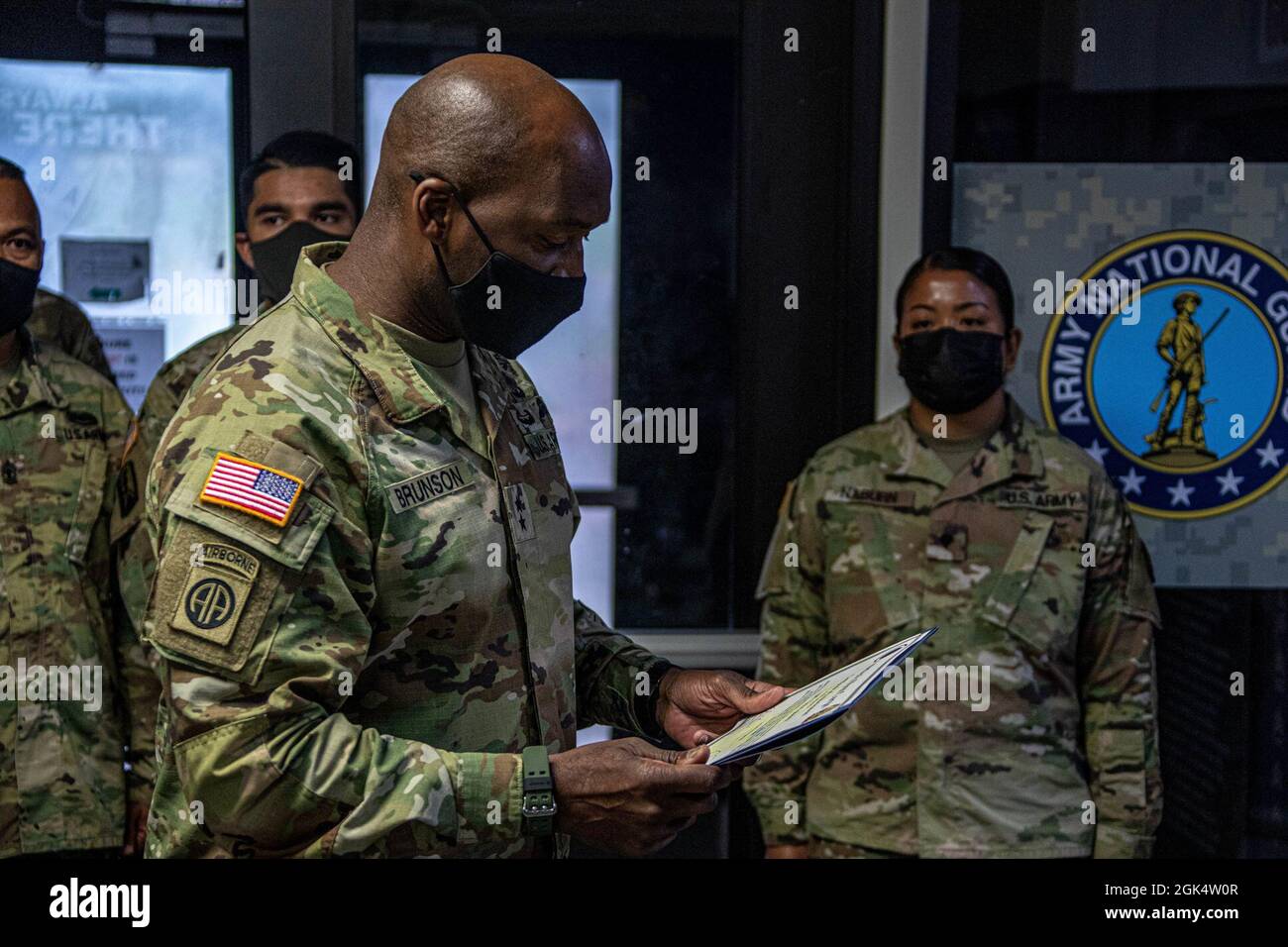 Maj. Gen. Xavier T. Brunson, the I Corps commanding general, presents a ...