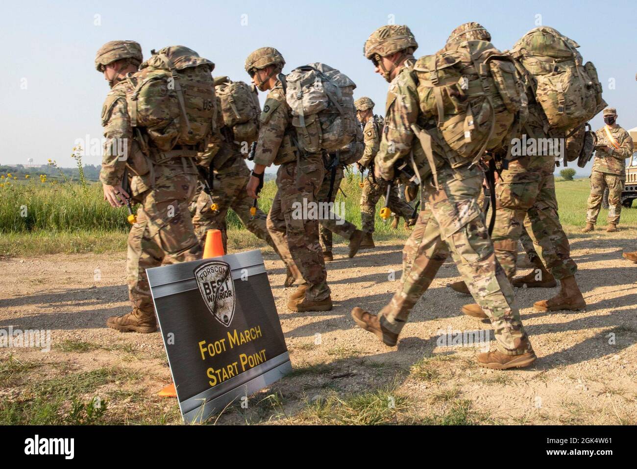 Competitors step off and participate in a ruck march event during the ...