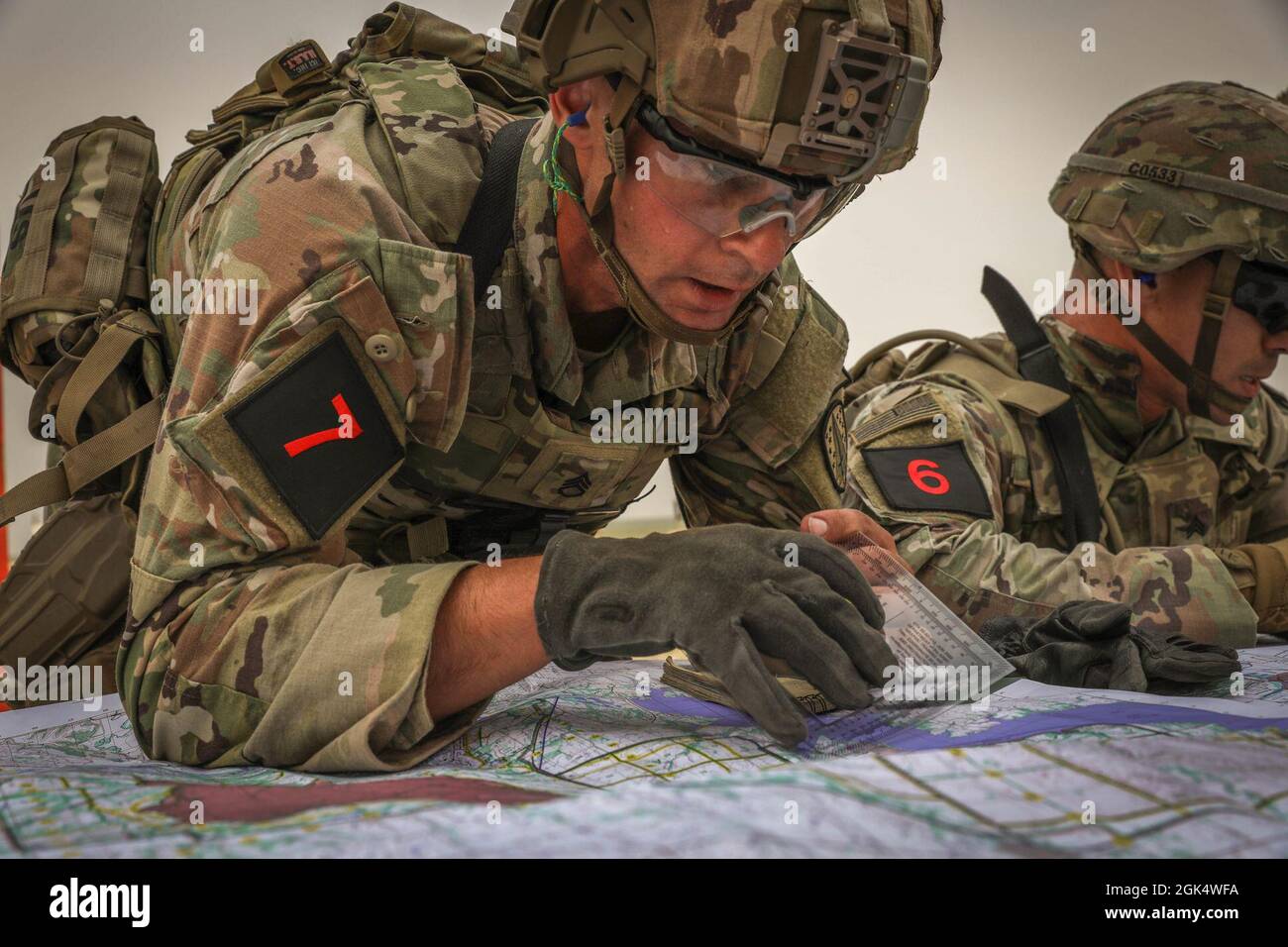 U.S. Army Sgt. Logan Engle, left, assigned to Security Forces ...