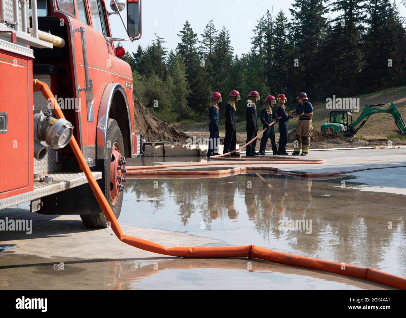 Firefighting hose handling techniques hi-res stock photography and ...