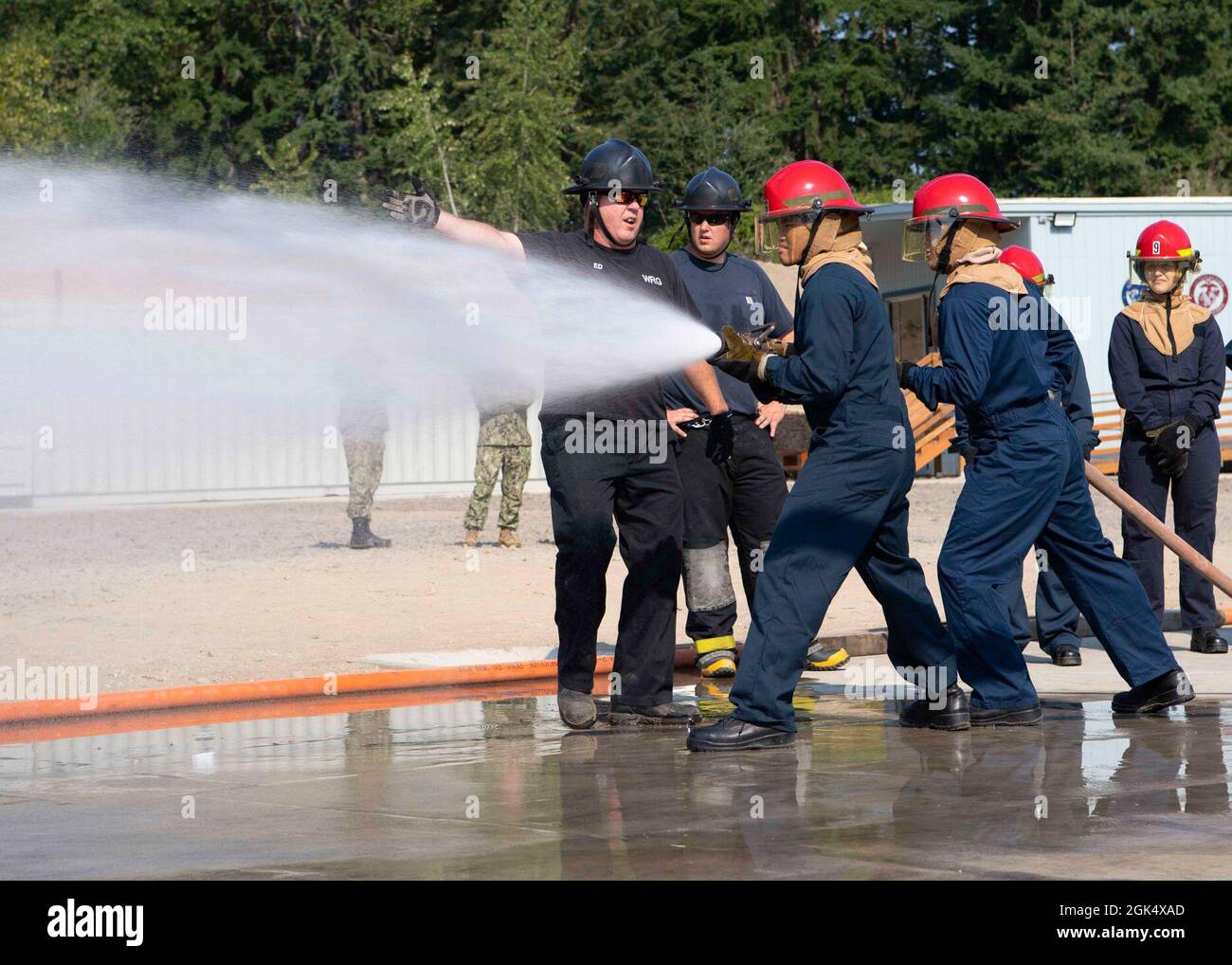 Firefighting hose handling techniques hi-res stock photography and ...