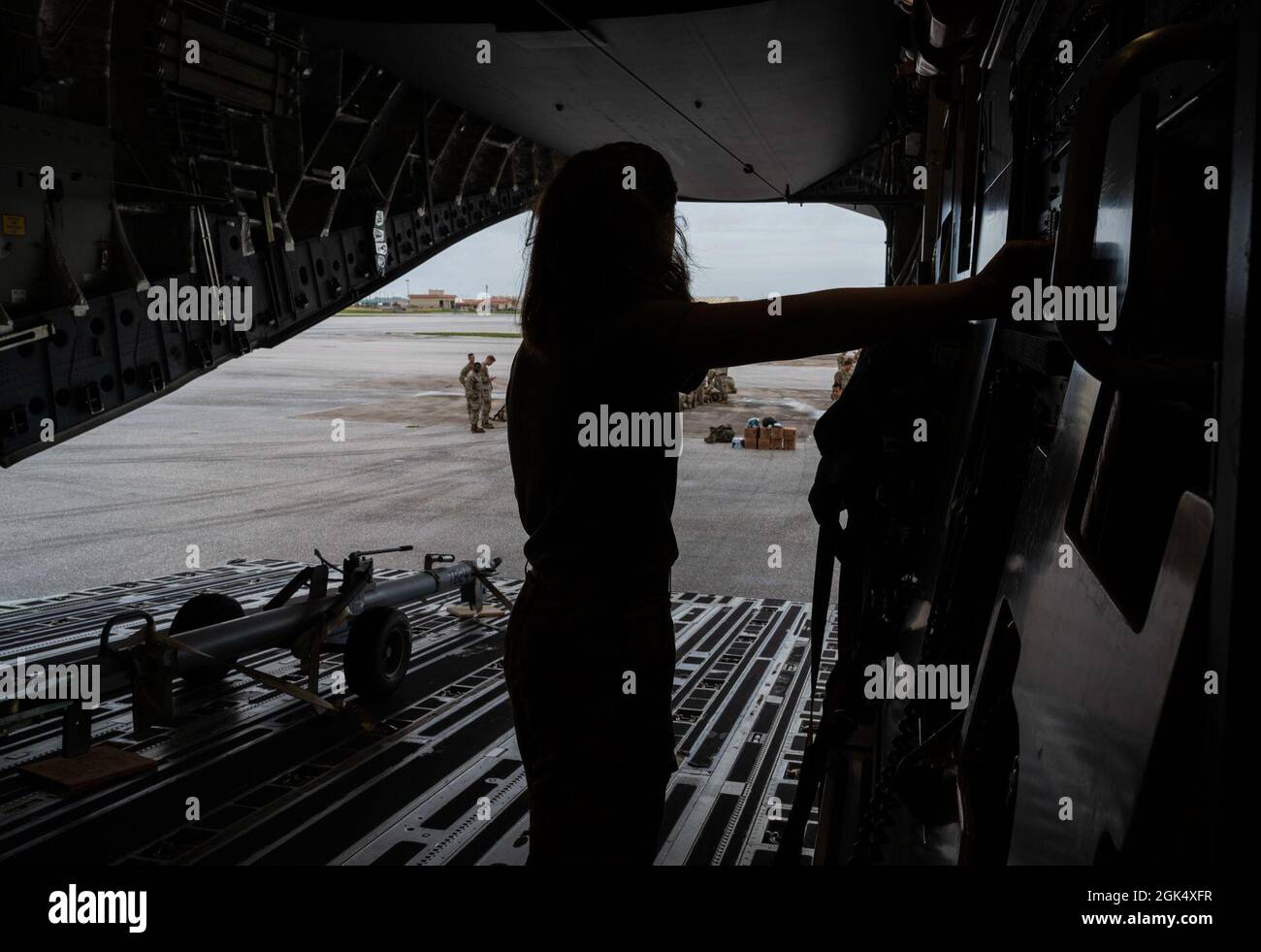 U.S. Air Force Senior Airman Kathleen Cook, a loadmaster with the 7th ...
