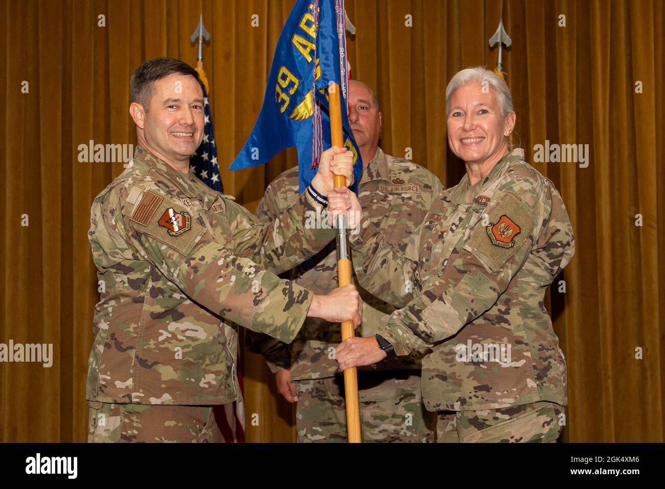 Col. John Kelly, 39th Air Base Wing vice commander, passes the guidon ...