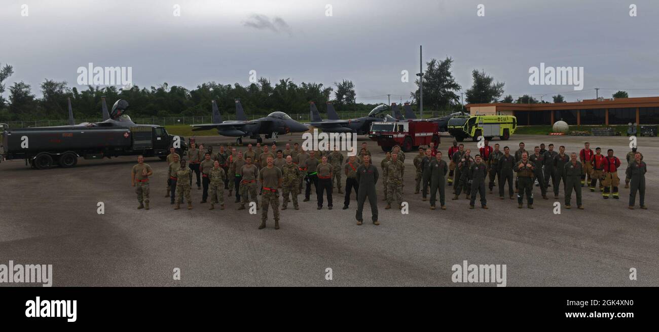 U.S. service members pose for a group photo at the Tinian International ...