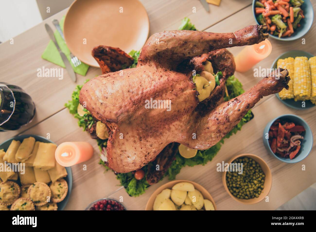 High angle photo of huge tasty roasted turkey lying holiday table ...