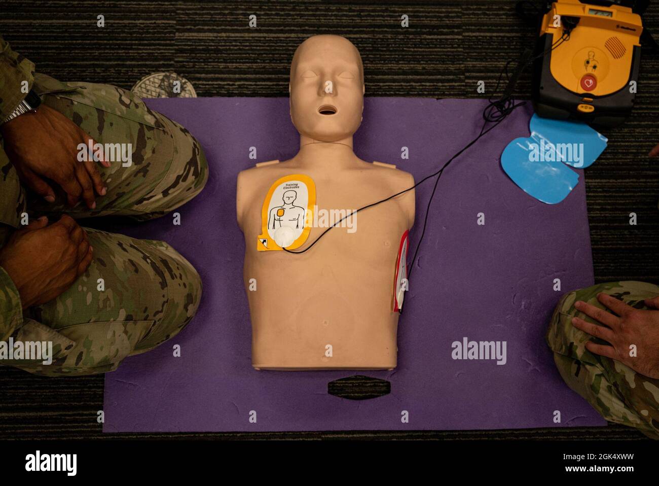 Airmen practice CPR during a life support course at the Mike O ...
