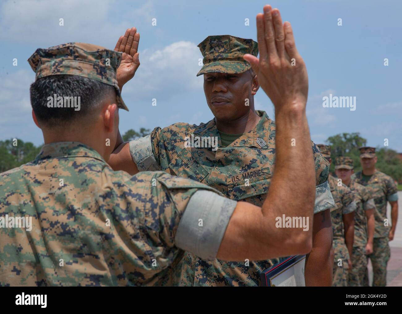 U.S. Marine Corps Master Sgt. David E. Smith takes the oath of ...
