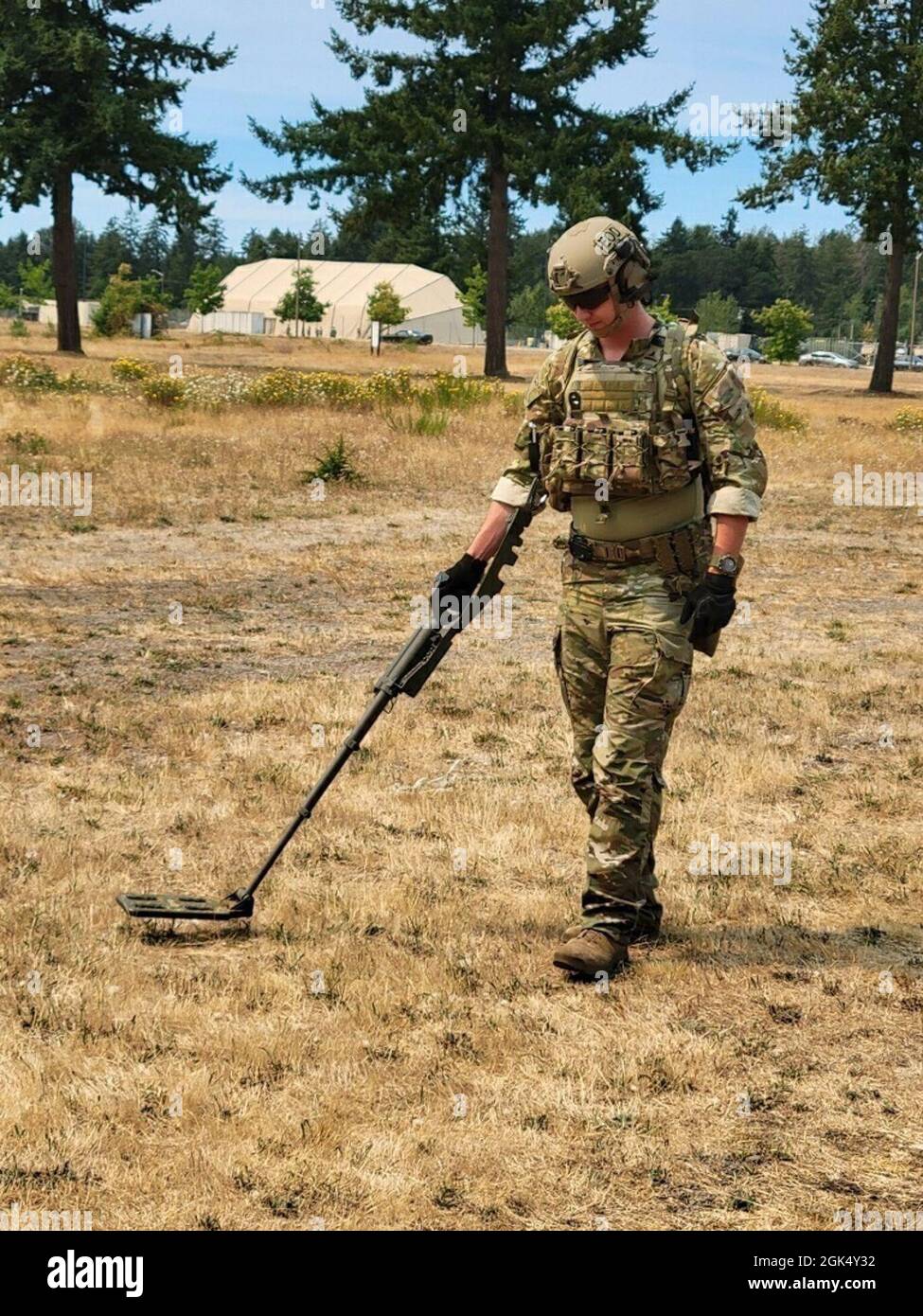 Pfc. Conor L. Neely conducts explosive ordnance disposal training. A ...