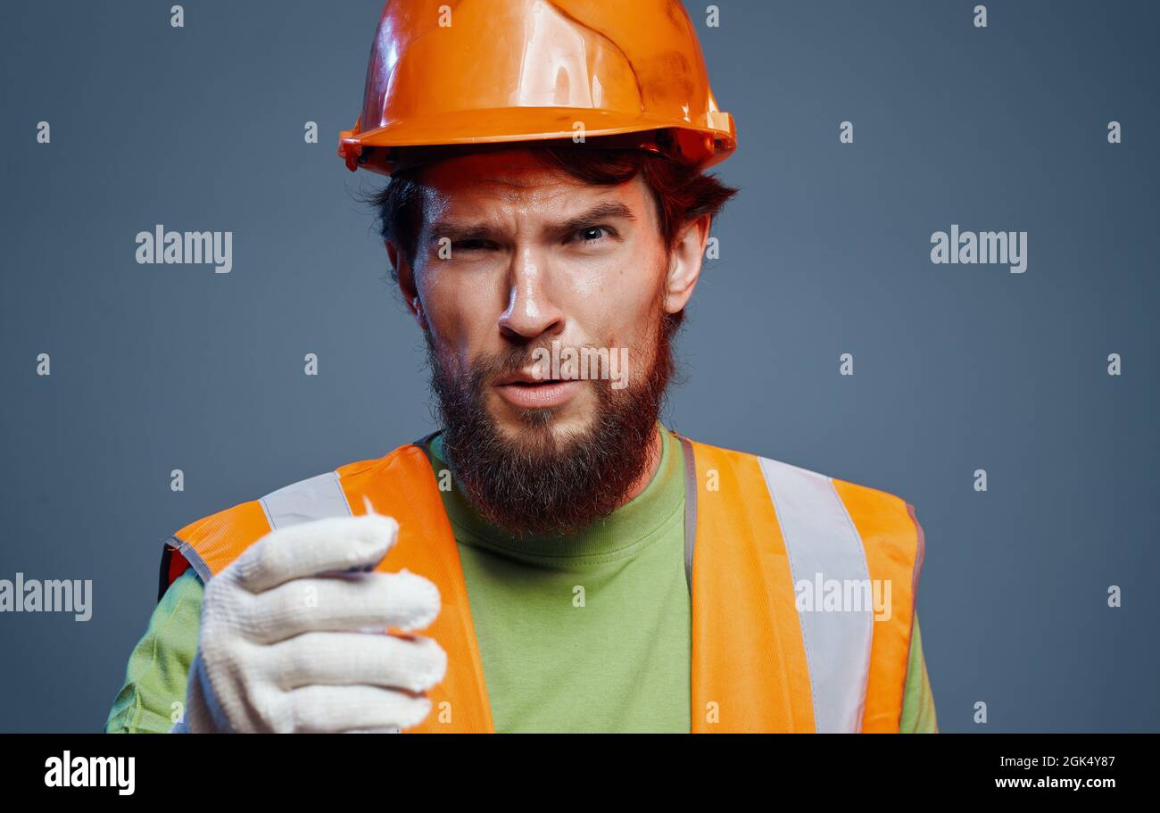 man in construction uniform orange helmet work Stock Photo - Alamy
