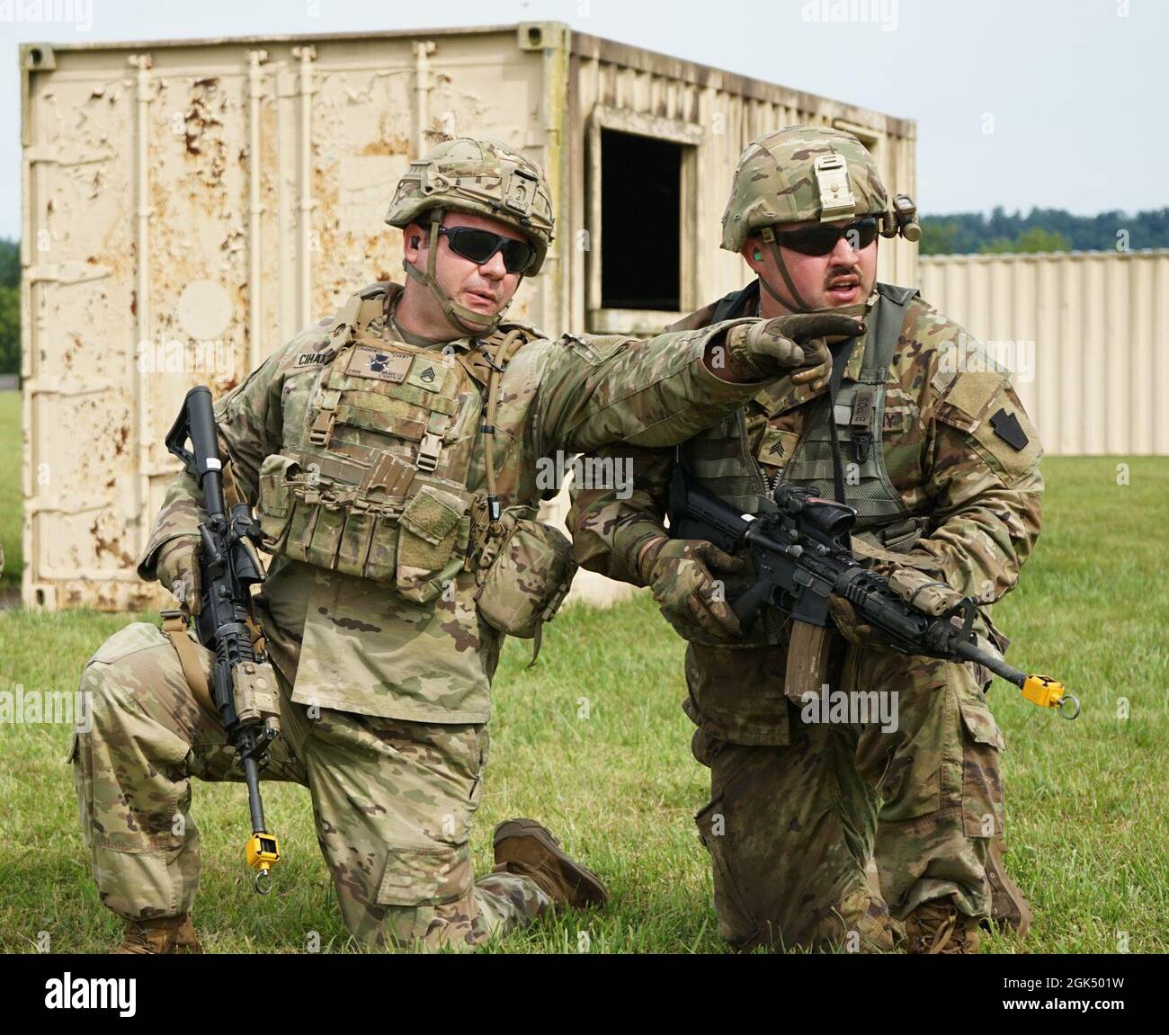 (Left) Staff Sgt. Richard Cihanowyz, Jr., squad leader for Bravo ...