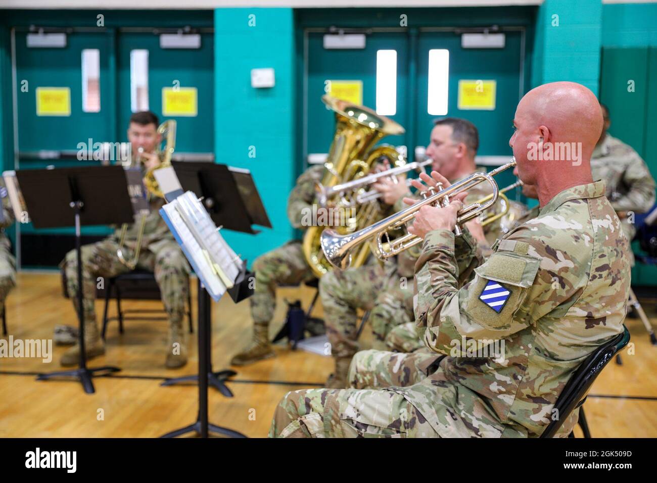 The 3rd Infantry Division band performs during an uncasing ceremony for ...