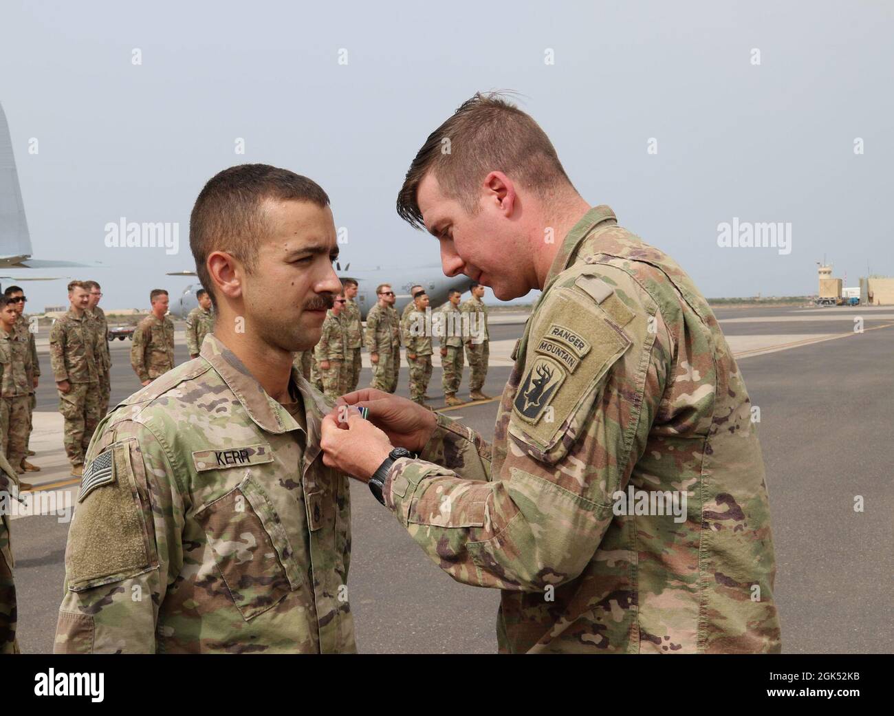 Staff Sgt. Joseph Kerr, assigned to Apache Company, 1-102nd Infantry ...
