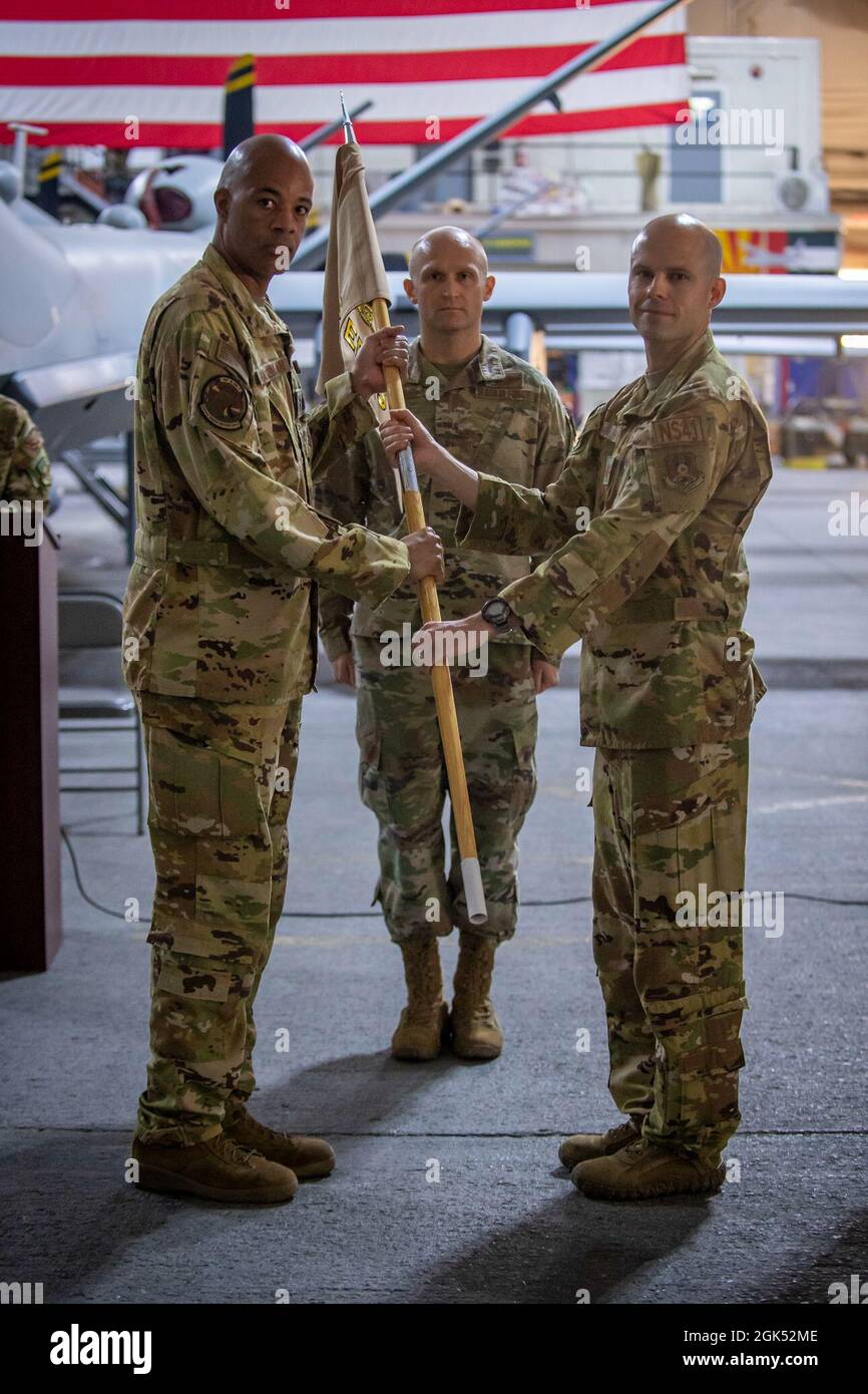 U.S. Air Force Maj. David T. Brown (right), outgoing 41st Expeditionary ...