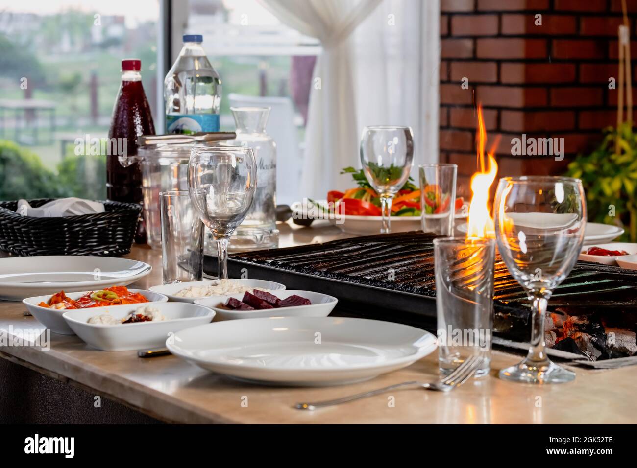 Different types of meat grilled on Barbecue on the table, Served with ...