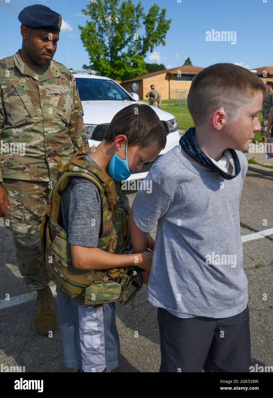 Kids in handcuffs hi-res stock photography and images - Alamy