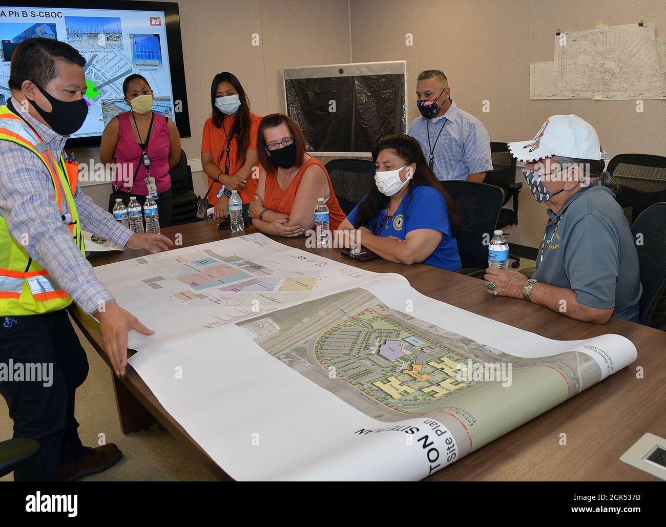 A group of Veterans from American Legion Karl Ross Post 16 listen to a ...