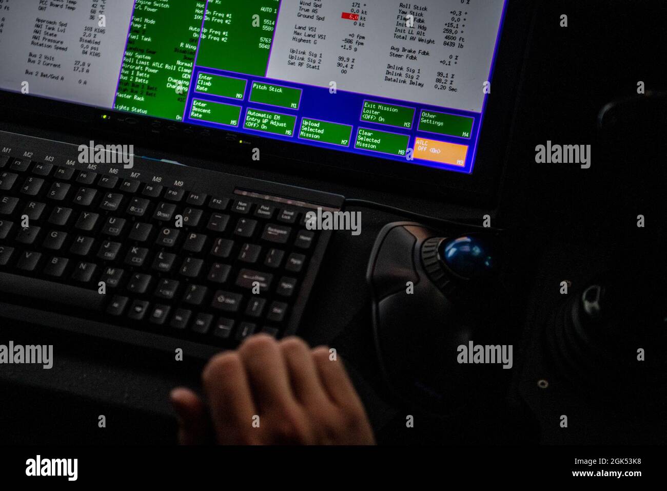 An MQ-9 Reaper pilot from the 489th Attack Squadron prepares to take ...