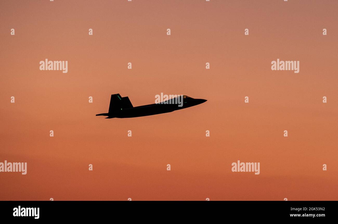 An F-22 Raptor assigned to Joint Base Langley-Eustis, Virginia, takes ...