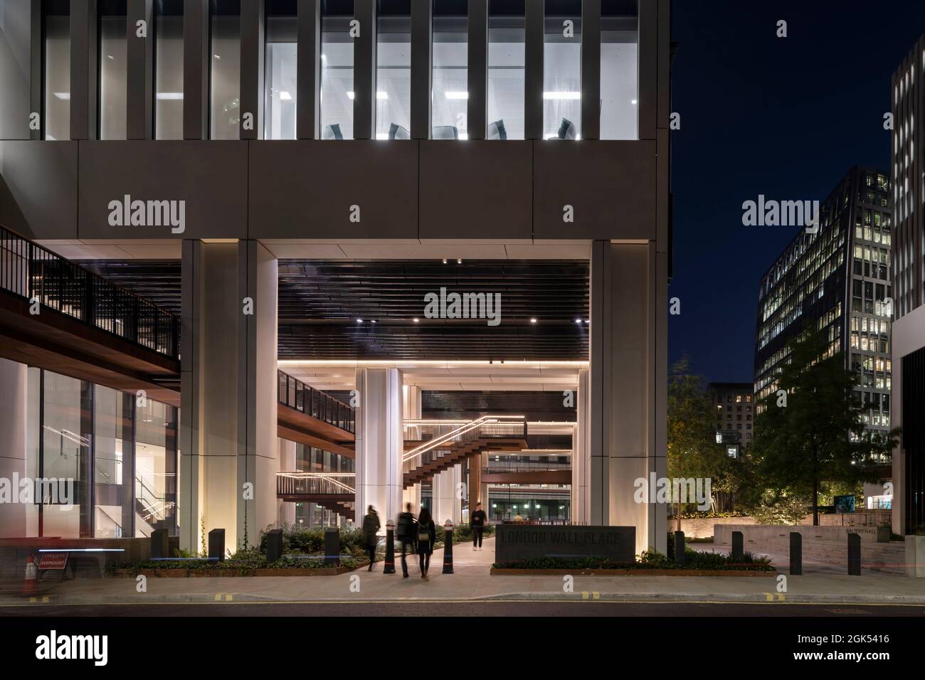 View from Fore Street back to covered pedestrian route at night showing ...