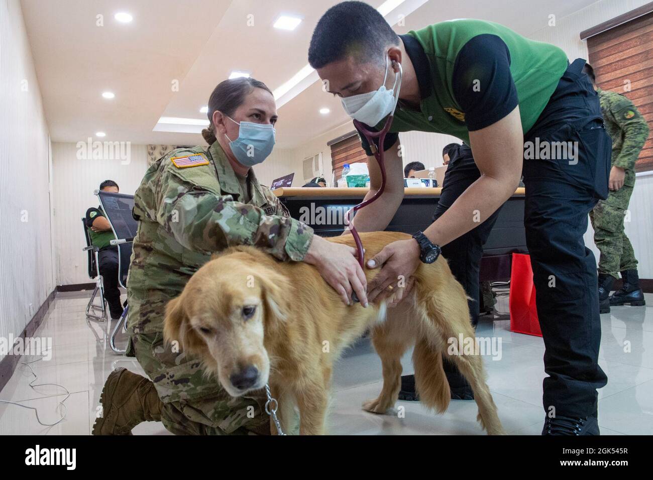MANILA, Philippines (August 4, 2021) - U.S. Army Maj. Maren Mason, left ...
