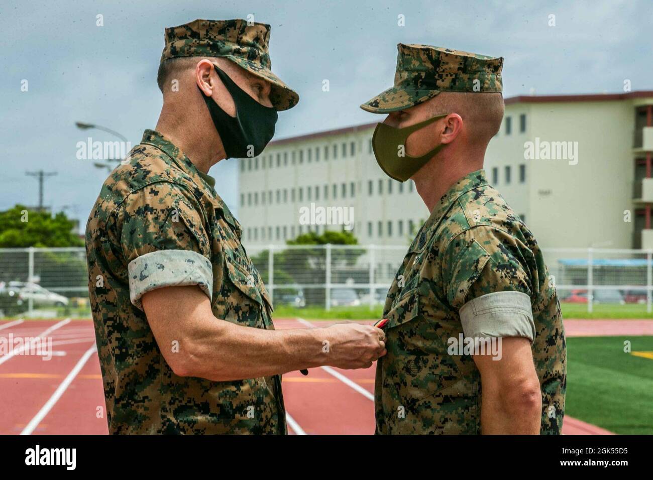 U.S. Marine Corps Brig. Gen. Brian N. Wolford, left, commanding general ...