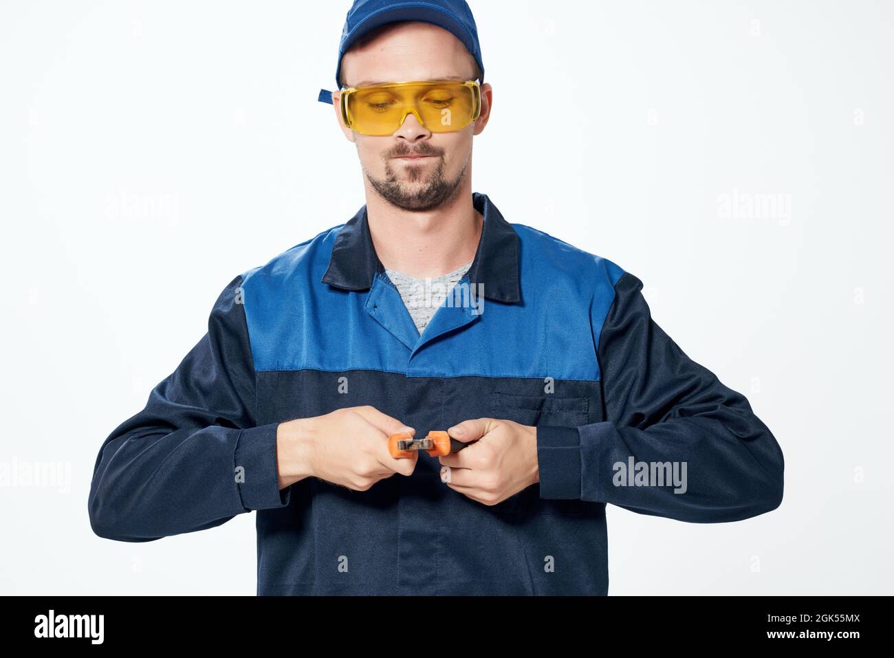 Man in yellow construction glasses emotions isolated background Stock ...