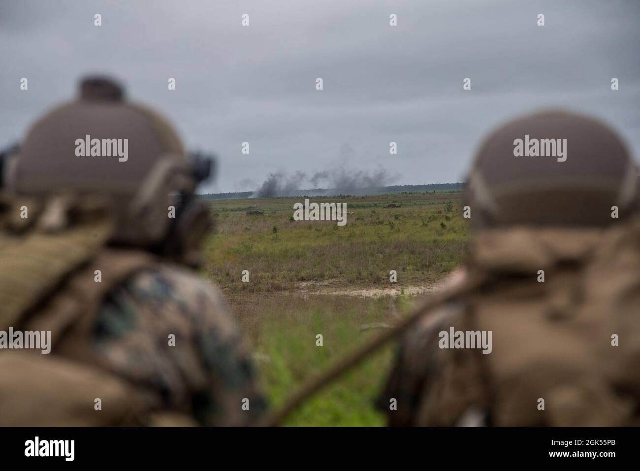 U.S. Marines with 2nd Air Naval Gunfire Liaison Company, observe ...