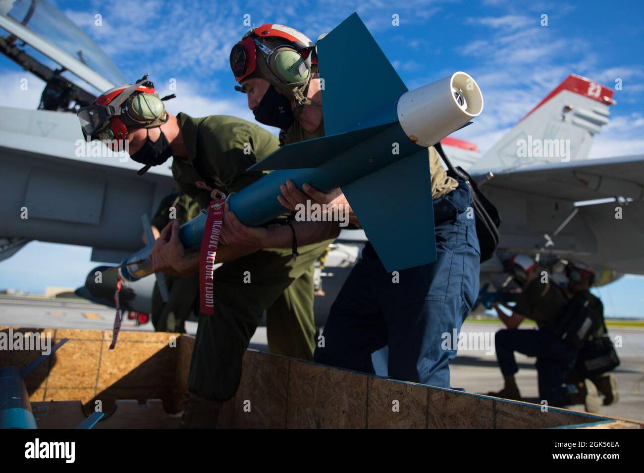 U.S. Marine Corps Cpl. Parrish Delatte, left, and Adam Nicholoff ...