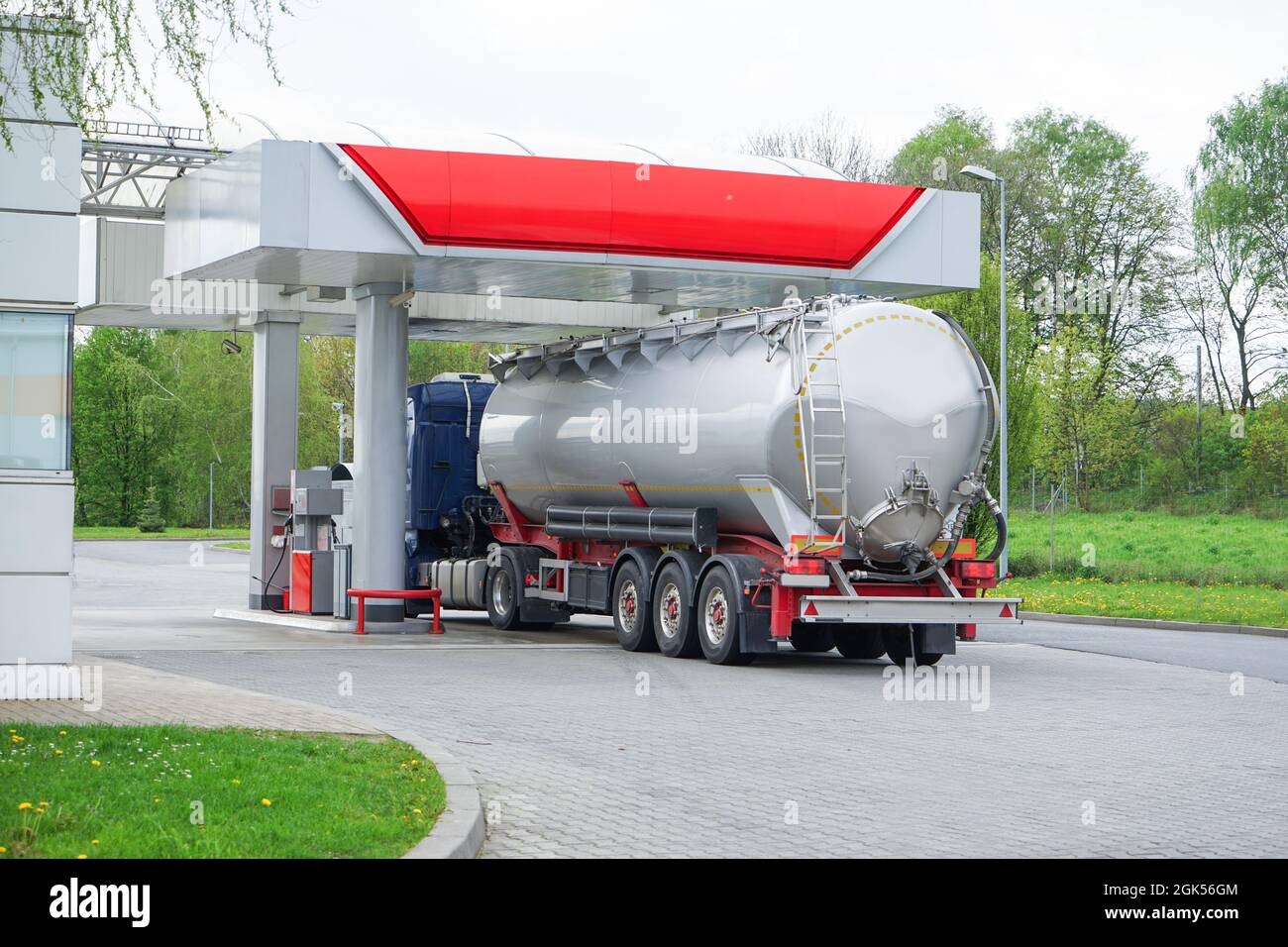 View of gas petrol station with cistern car Stock Photo - Alamy