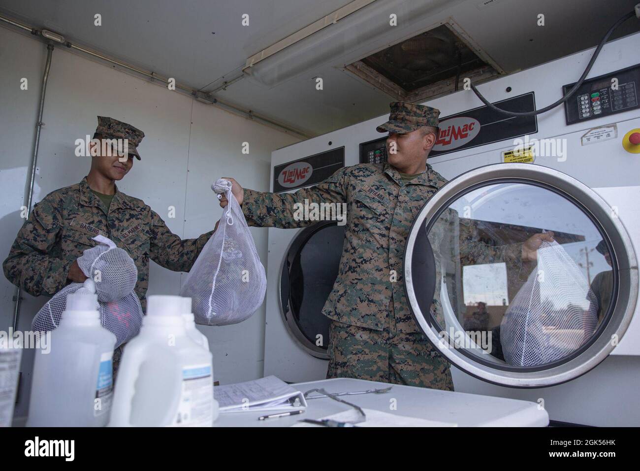 U.S. Marine Corps Lance Cpl. Jerick Bareng (left), and Lance Cpl. Erick ...