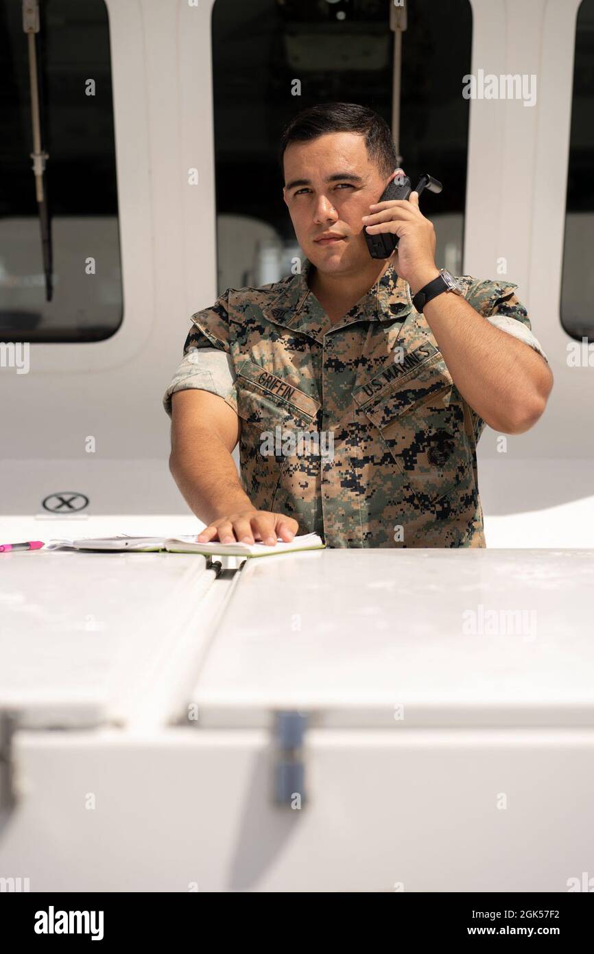U.S. Marine Corps Sgt. Gregory Griffin, a communications specialist ...