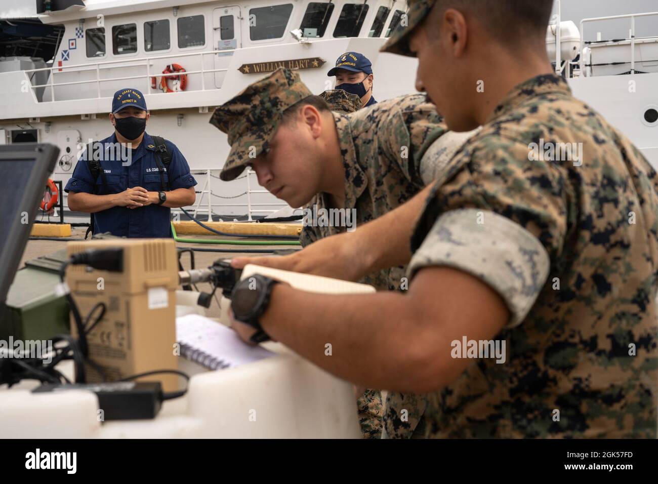 U.S. Marines and Coast Guardsmen establish communications with USCGC ...