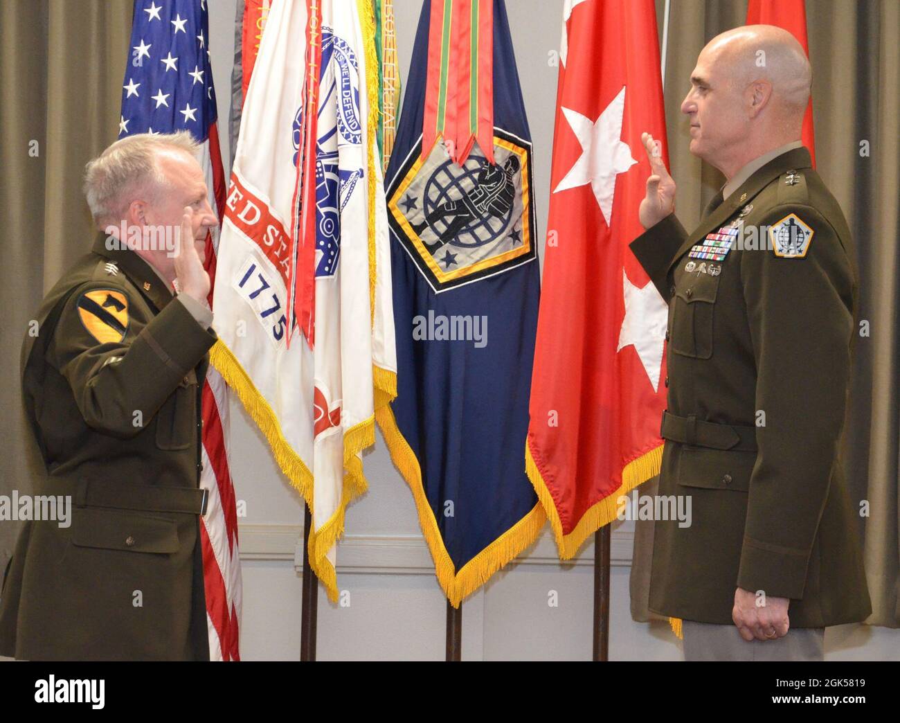 Lt. Gen. Douglas Gabram (left), commander of U.S. Army Installation ...