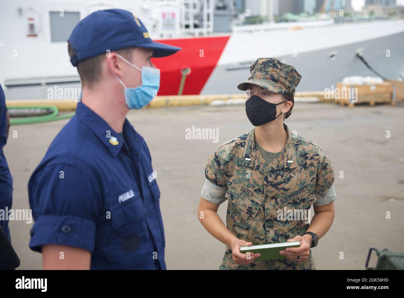 U.S. Coast Guard Petty Officer 2nd Class Joshua Peebles acts as the ...