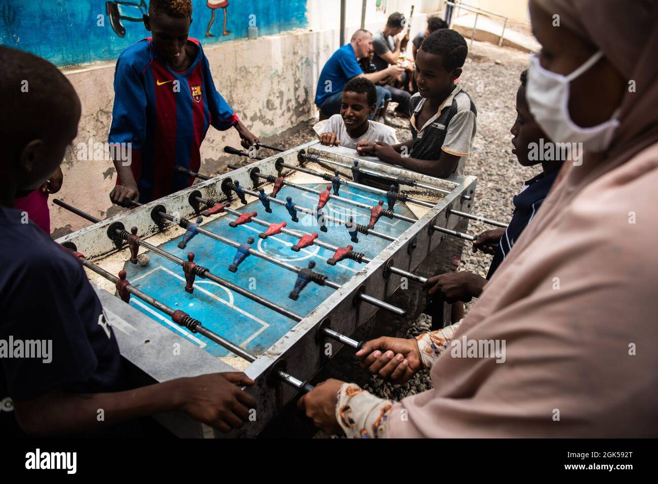 U.S. service members visit and play games with children at Caritas ...