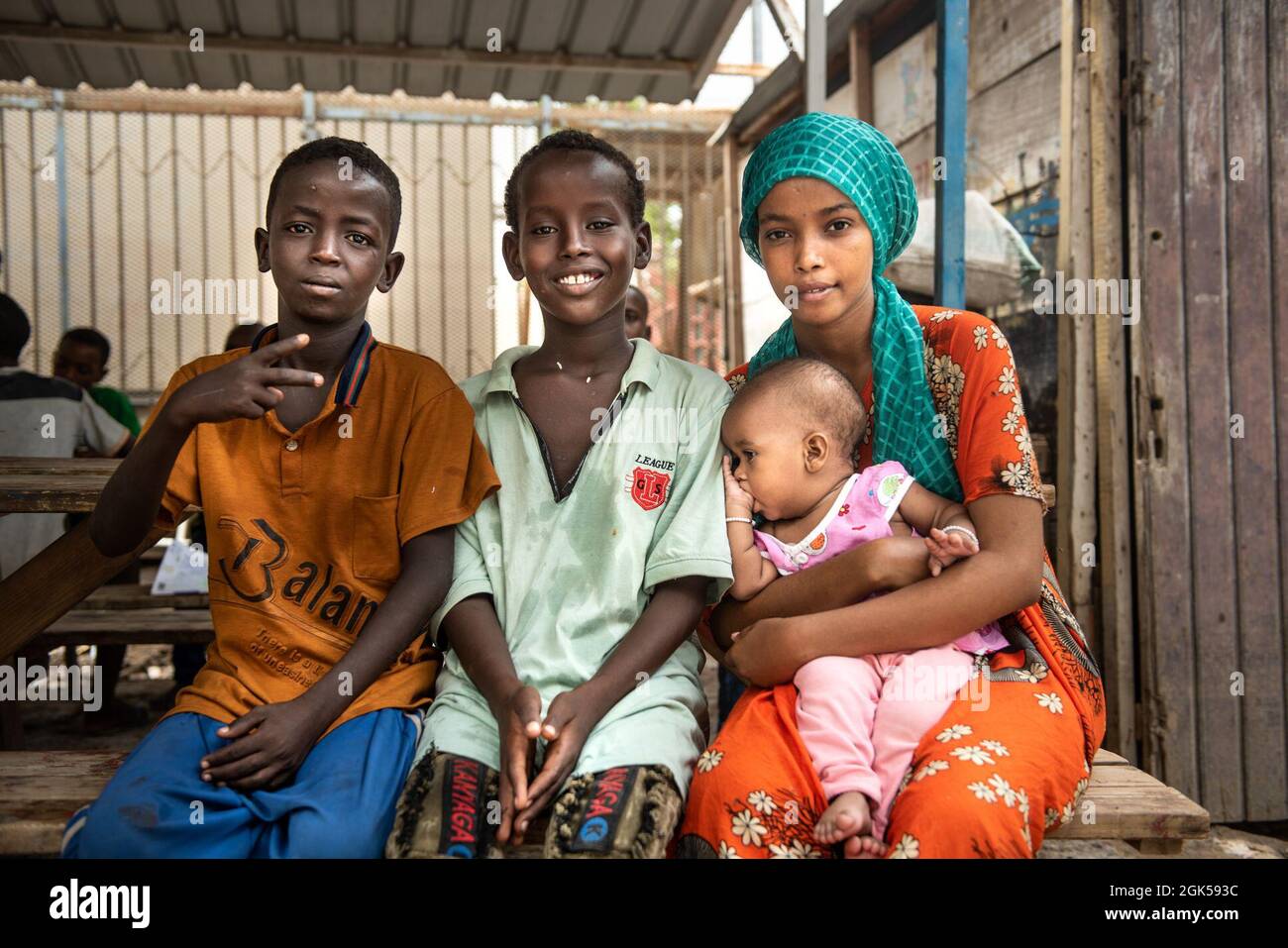 U.S. service members visit and play games with children at Caritas ...